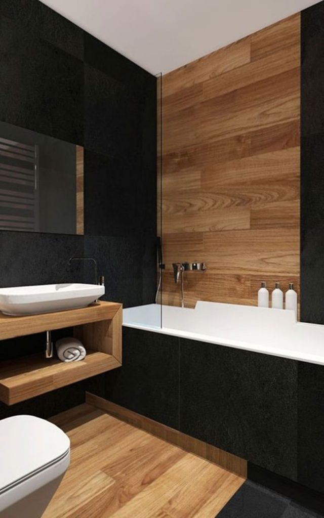 Baños en negro y madera para inspirarte